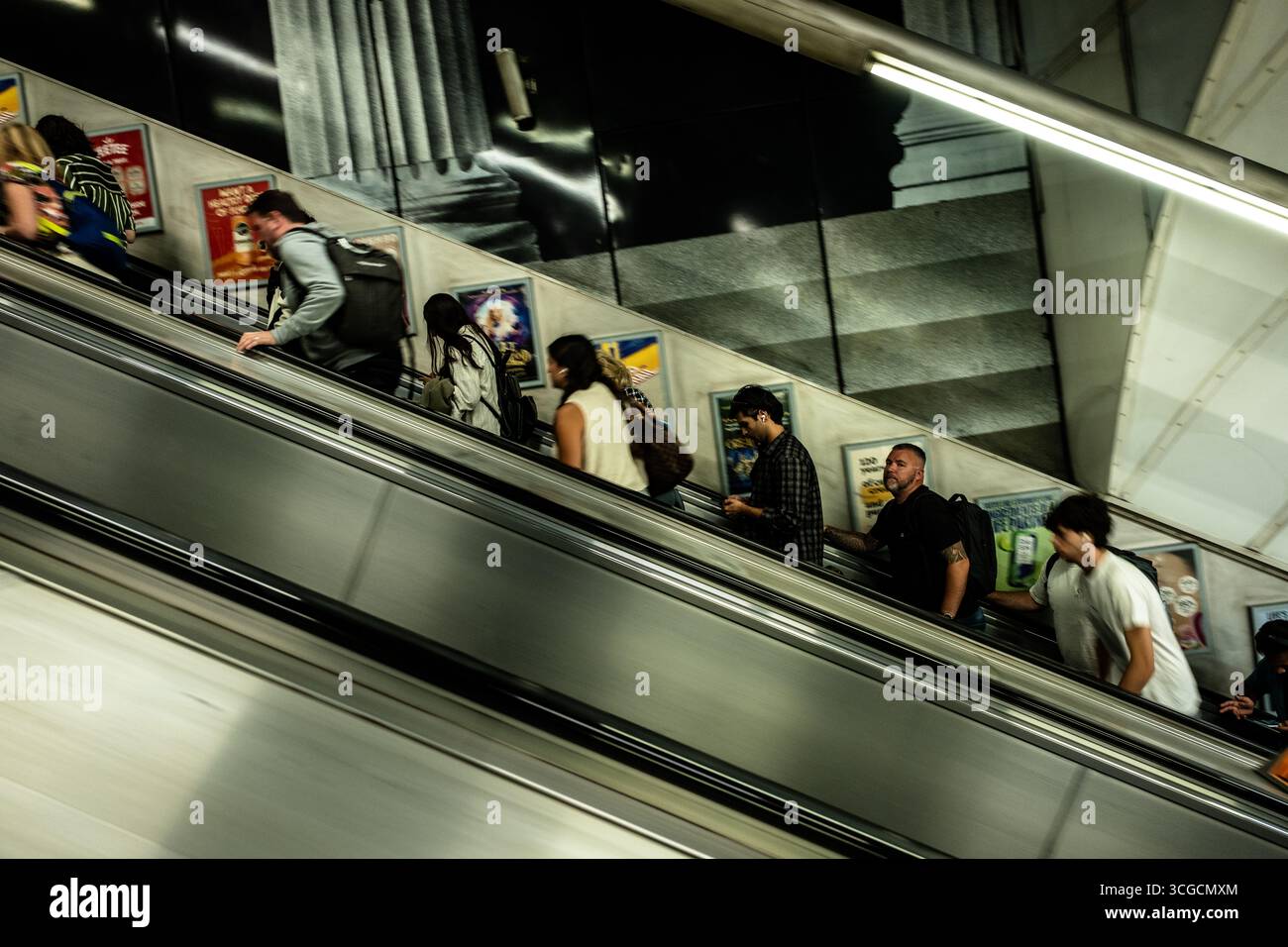 London Underground Moments. People at the platform of the undergorund ...