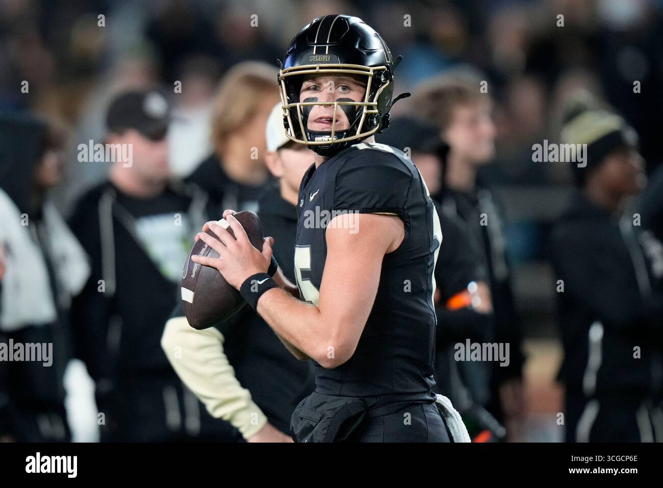 FILE - Purdue quarterback Ryan Browne looks to throw during warmups ...