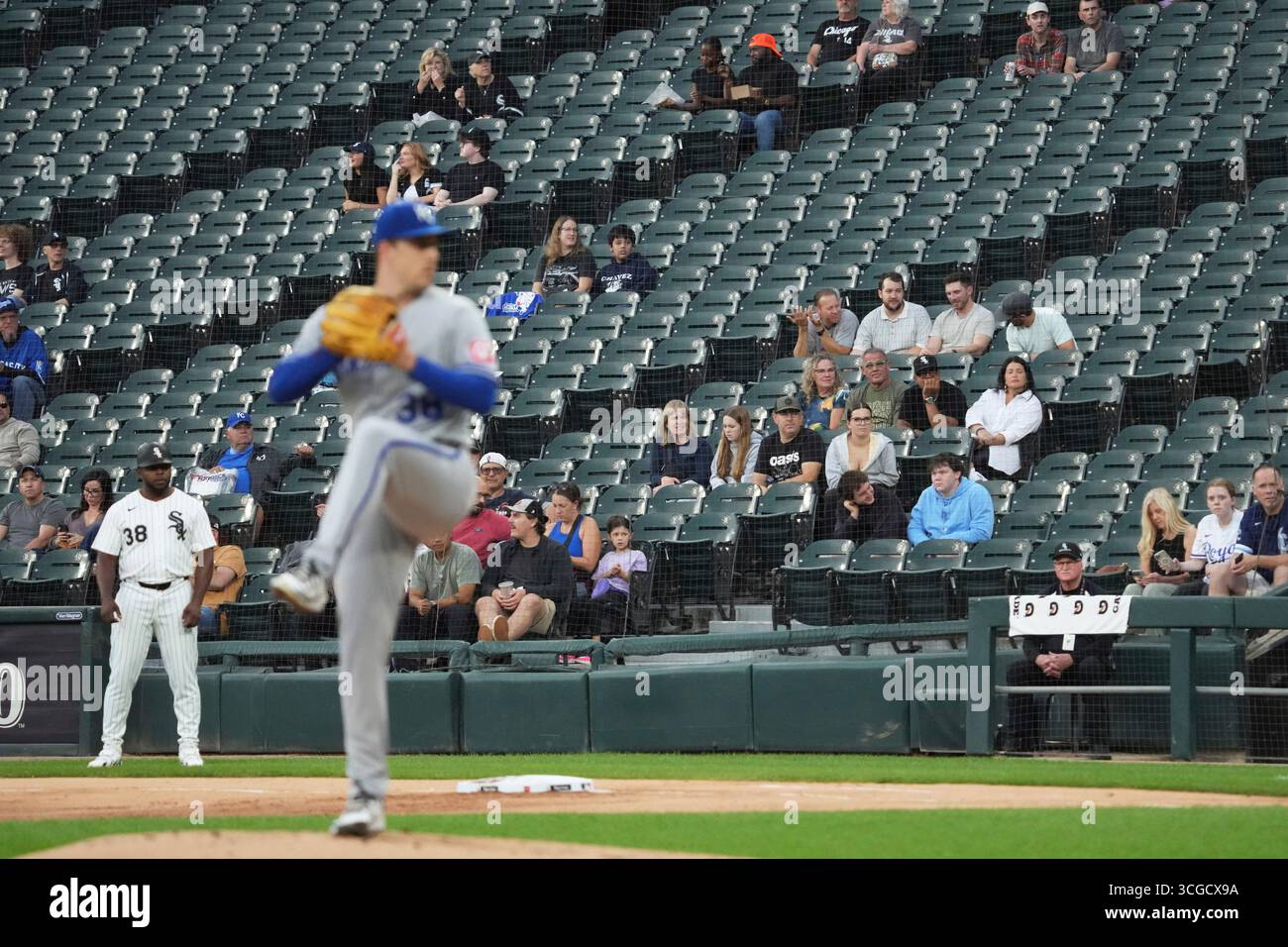 Baseball fans watch during the first inning of a baseball game between ...