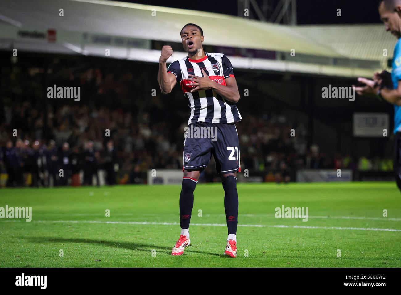 Grimsby Town defender Tyrell Warren (21) celebrates his penalty ...