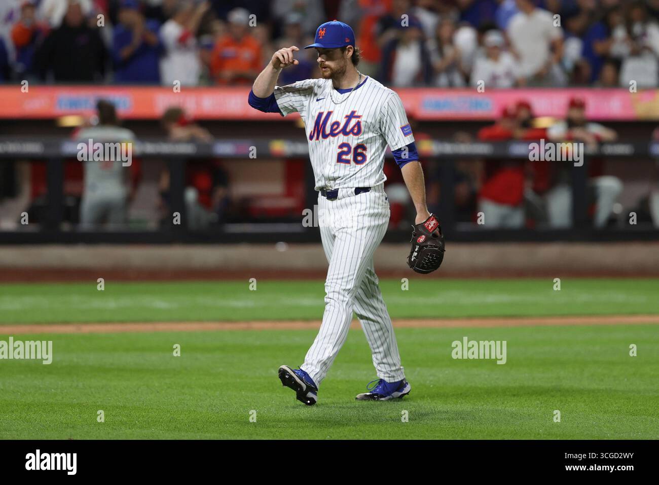 New York Mets pitcher Nolan McLean walks to the dugout during the ...