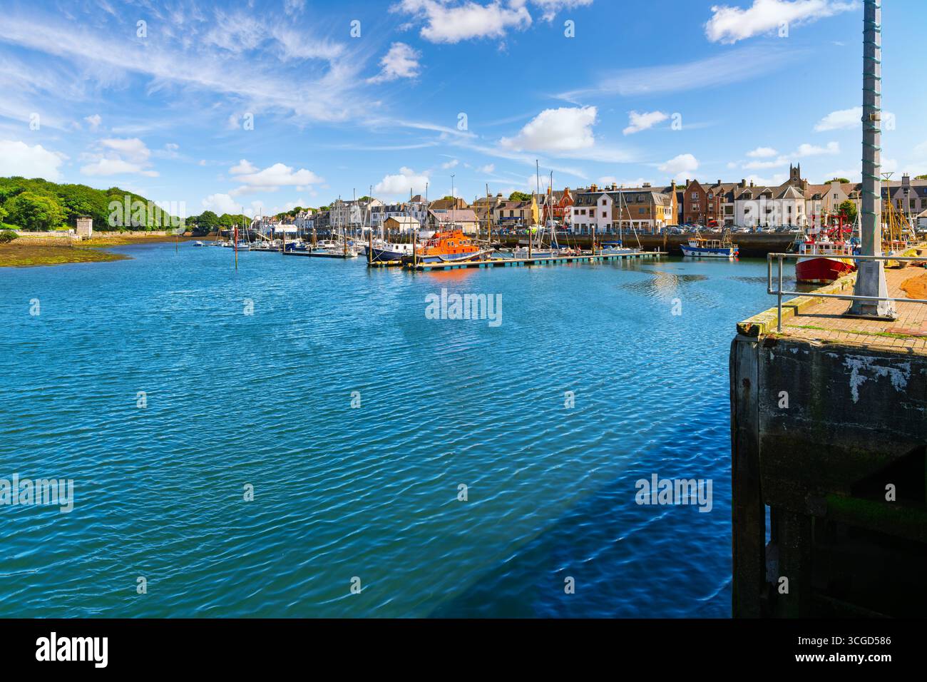 The seaside fishing village and harbor of Stornoway, Scotland, the ...