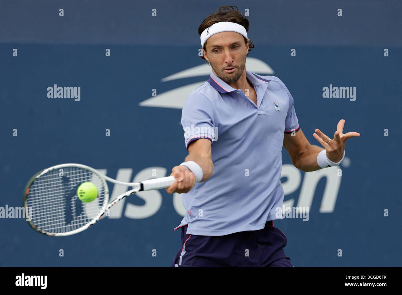 Arthur Rinderknech, of France, returns a shot to Alejandro Davidovich ...
