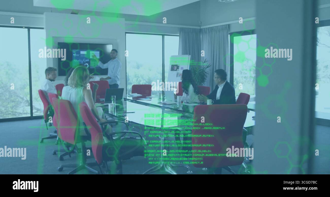 Pointing businessman presenting charts in conference room, with laptops ...