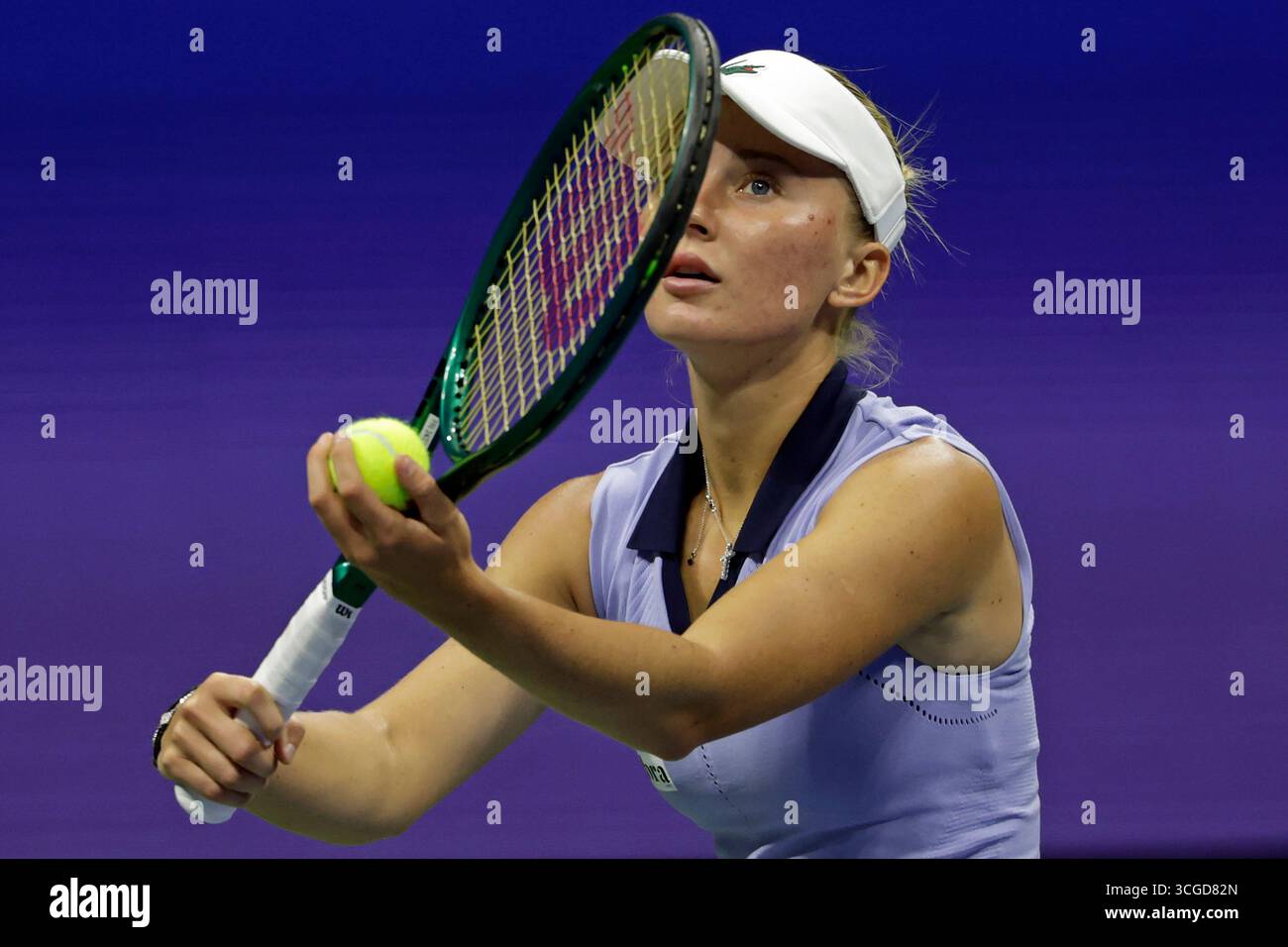 Polina Kudermetova, of Russia, serves to Aryna Sabalenka, of Belarus ...