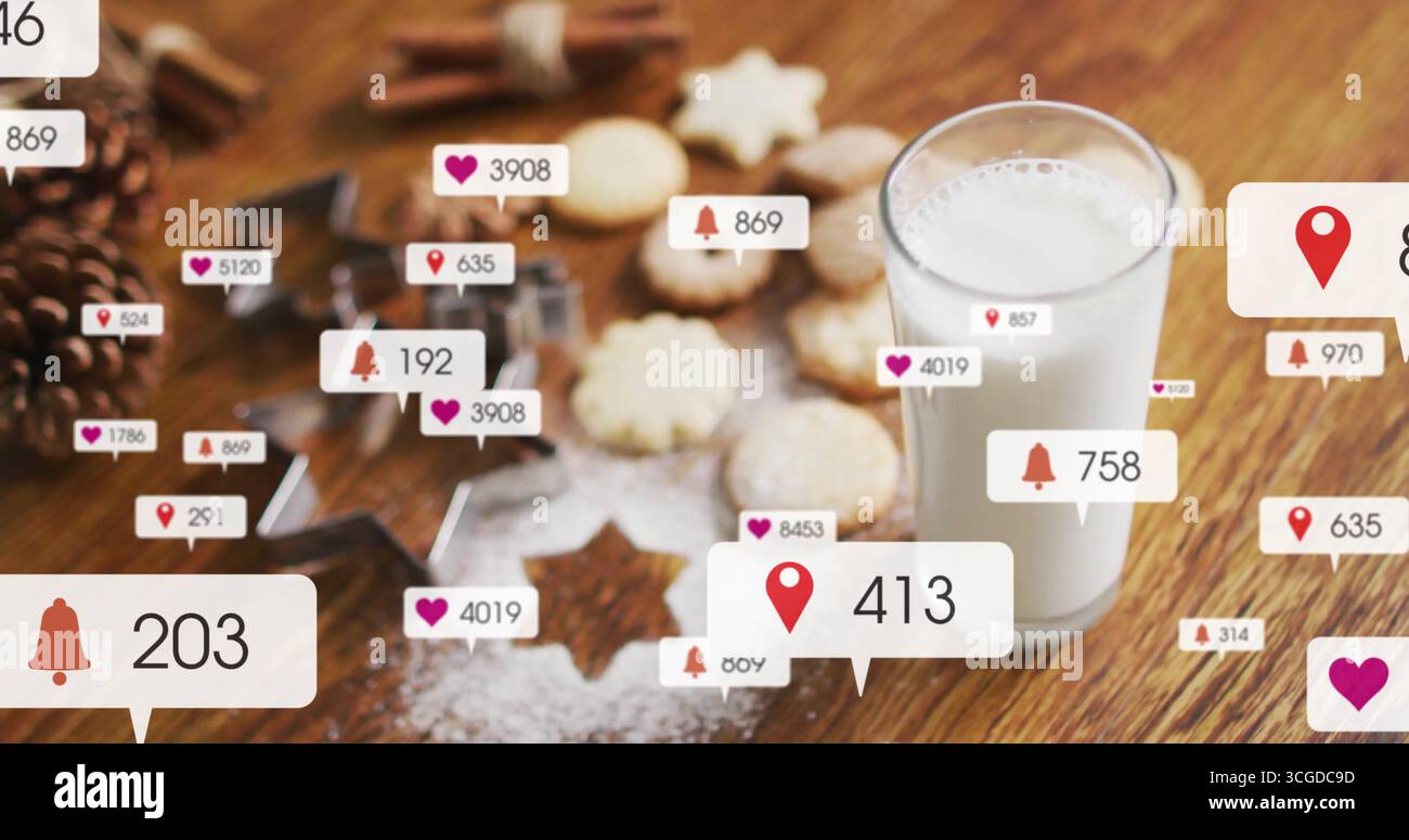 Showing tall glass of milk standing on kitchen table with star cookies ...