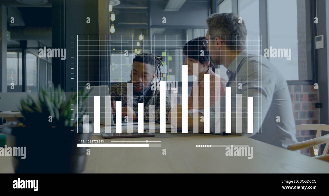 Reviewing team leaning around laptop showing data in office, with ...