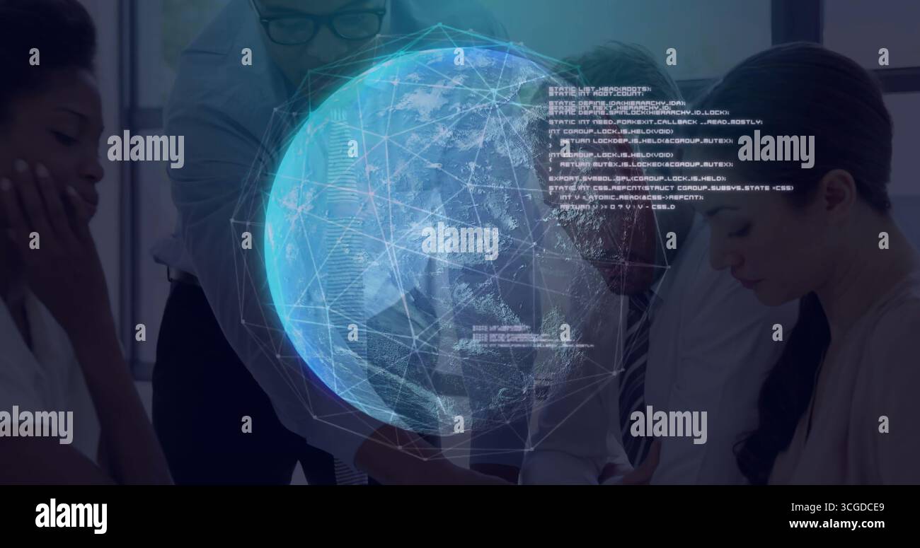 Studying network data business team leaning over conference table in ...