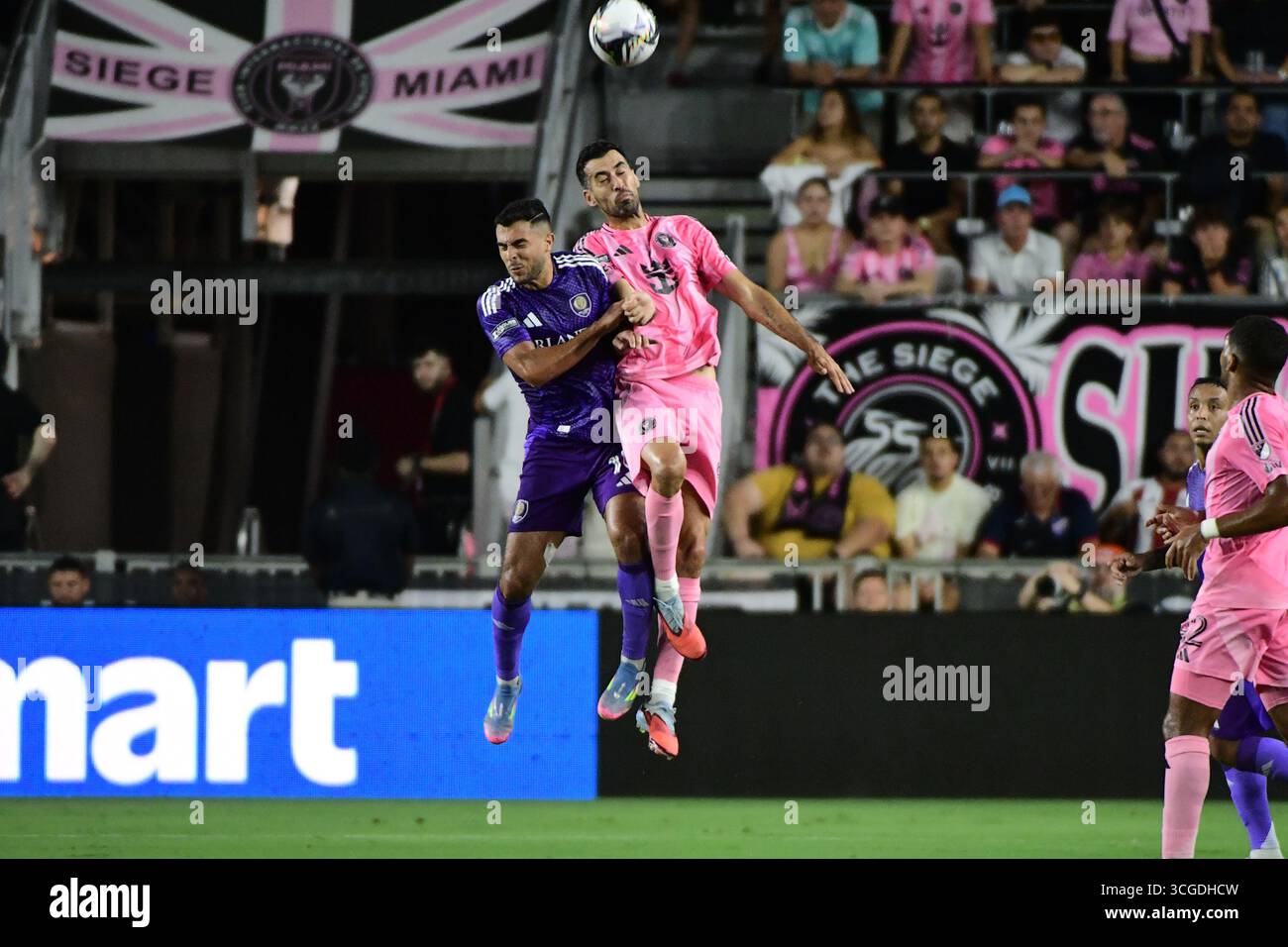 Inter Miami midfielder Sergio Busquets (5) battles for the header with ...