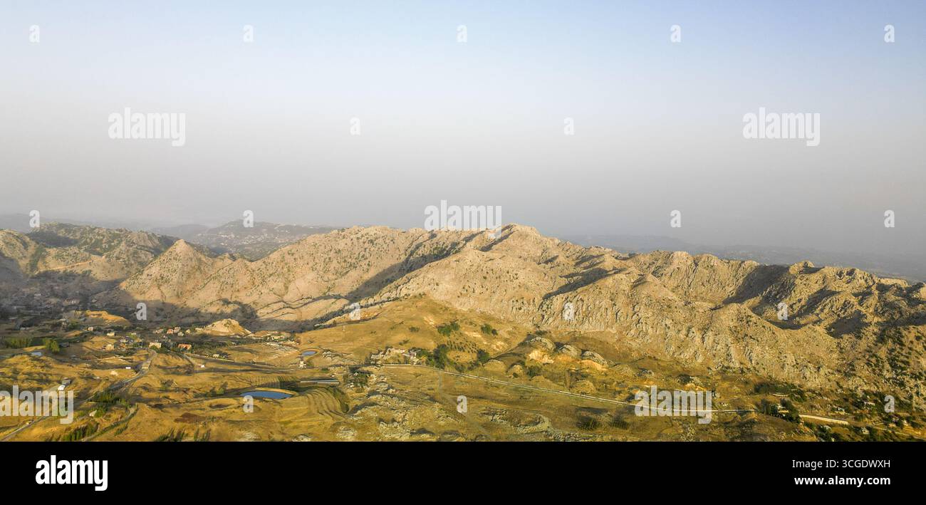 Arid mountains bathed in golden hi-res stock photography and images - Alamy