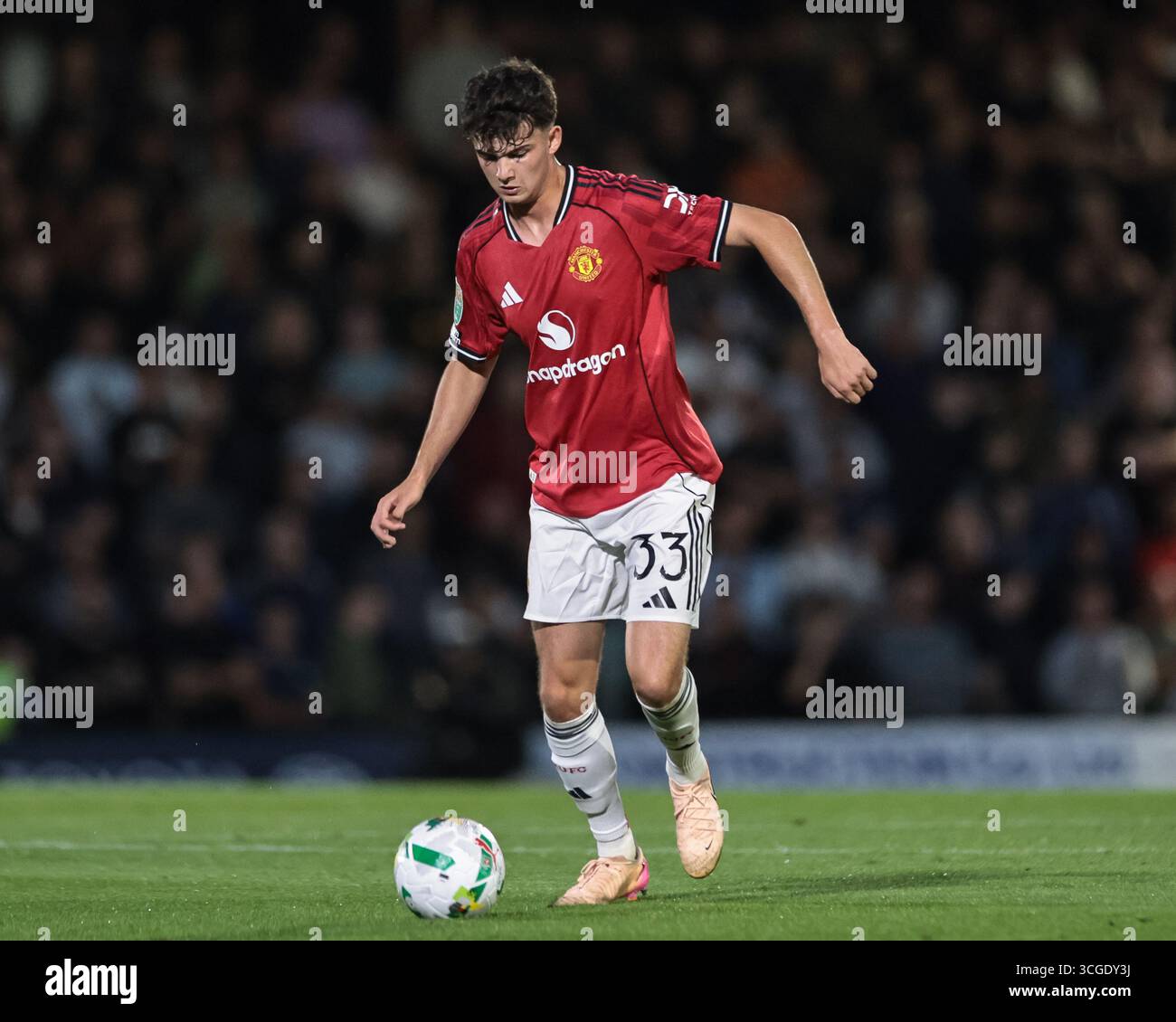 Tyler Fredricson of Manchester United with the ball during the Carabao ...