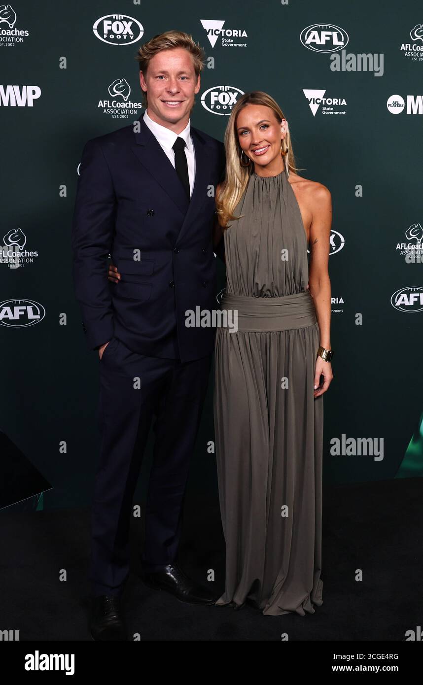 Swans player Isaac Heeney and partner Steffi Waters on arrival to the ...