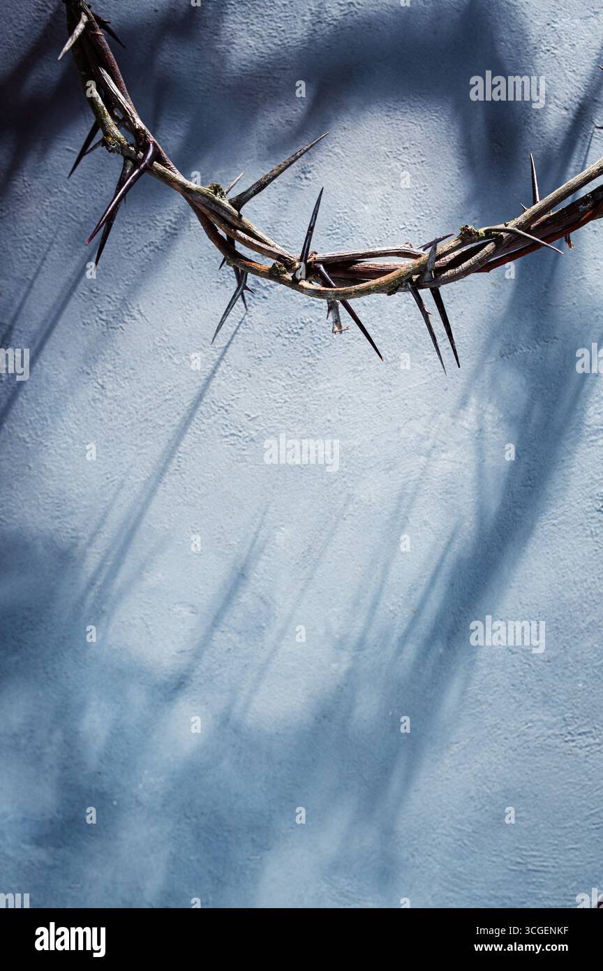 Jesus Christ Crown of thorns shadow silhouette against textured gray ...