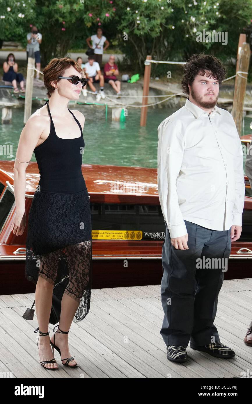 Emma Stone, left, and Aidan Delbis arrive at the 82nd edition of the ...