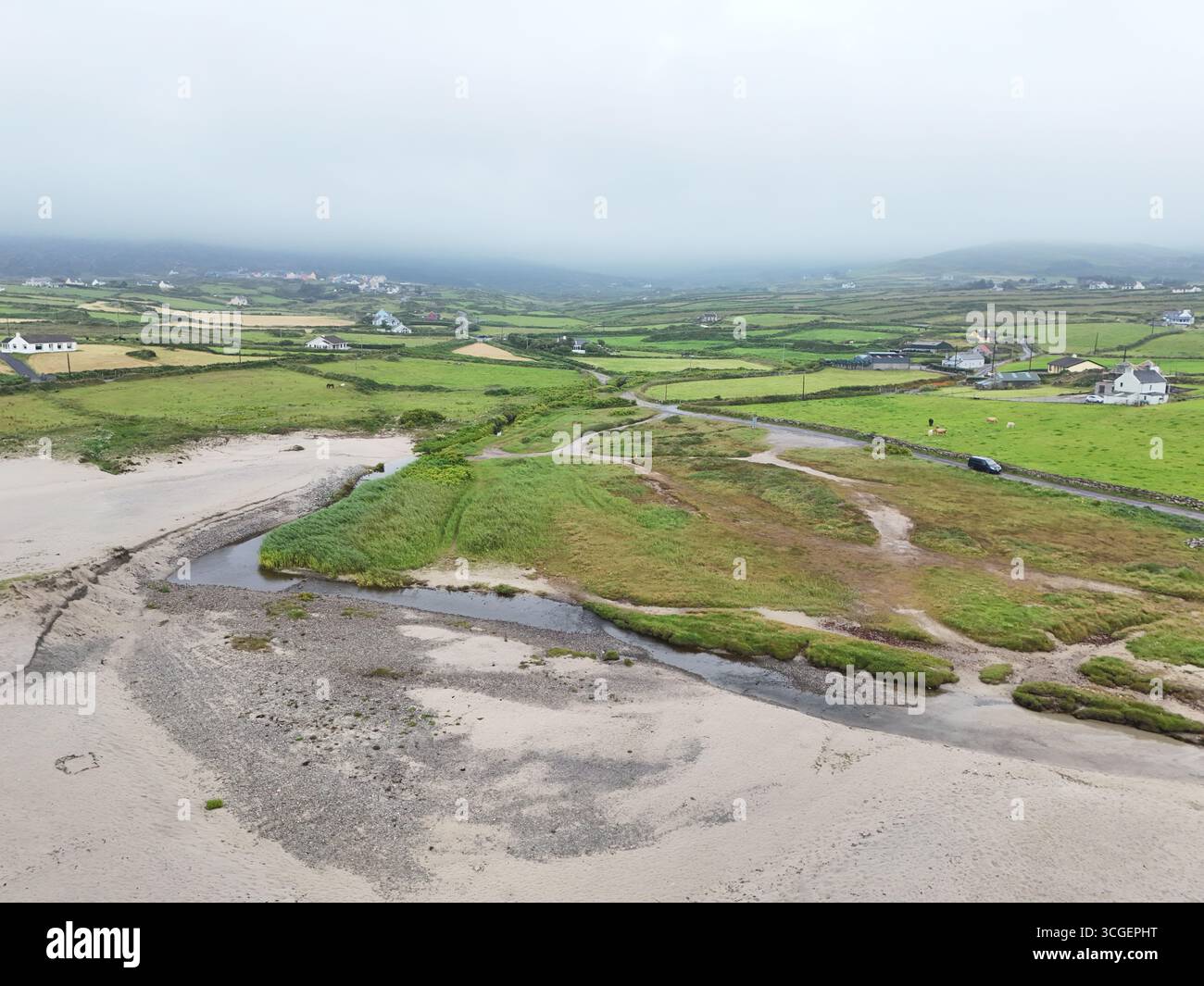 Cork, Ireland - 13th July 2025 - Aerial view of Ballydonegan Beach ...