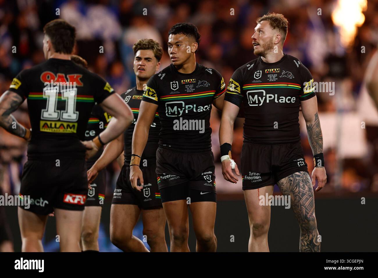 Dejected Panthers players after Jacob Preston of the Bulldogs third try ...