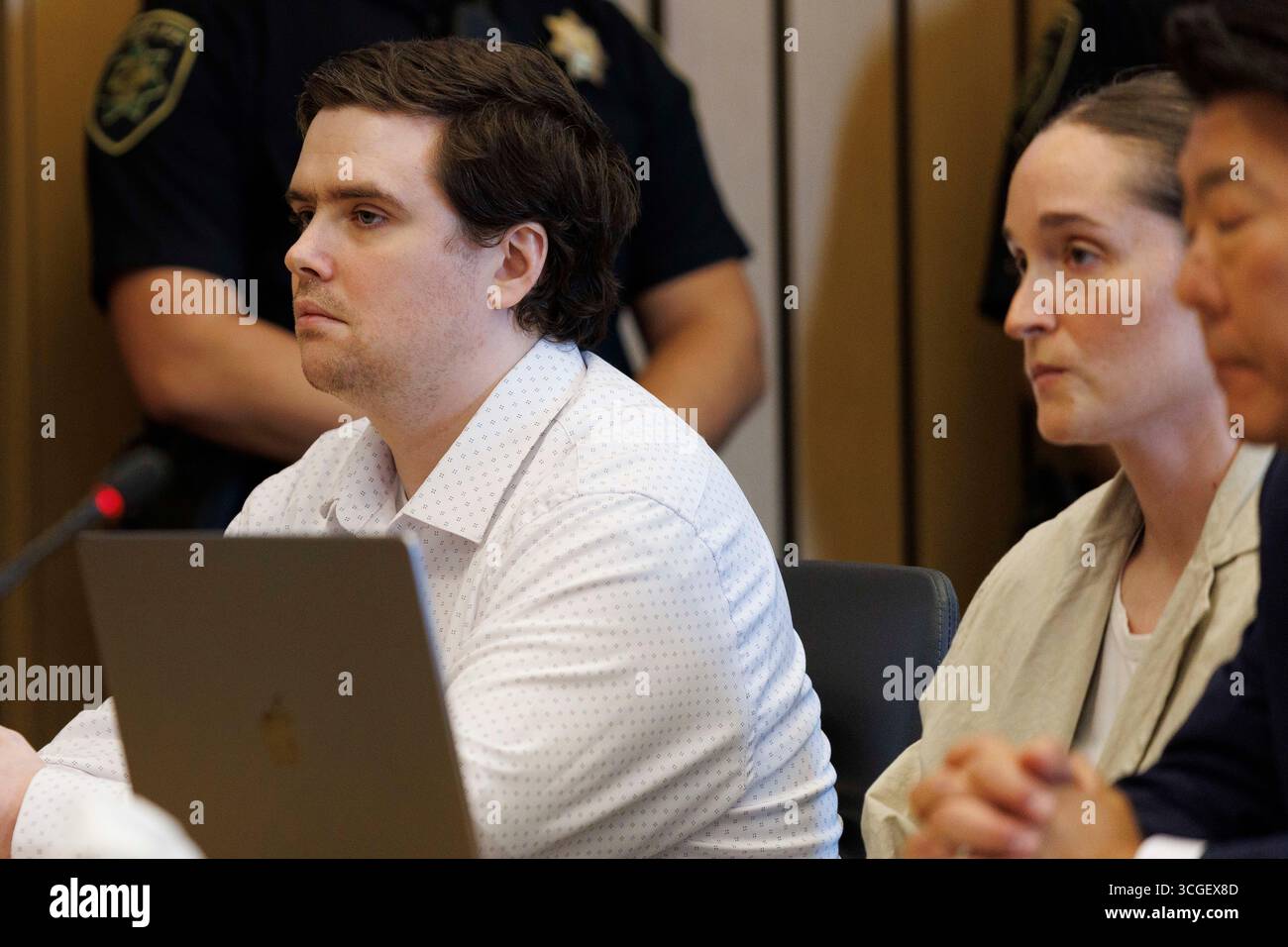 PORTLAND, OREGON, USA - August 27, 2025: Jonathan Grall (L) sits next ...
