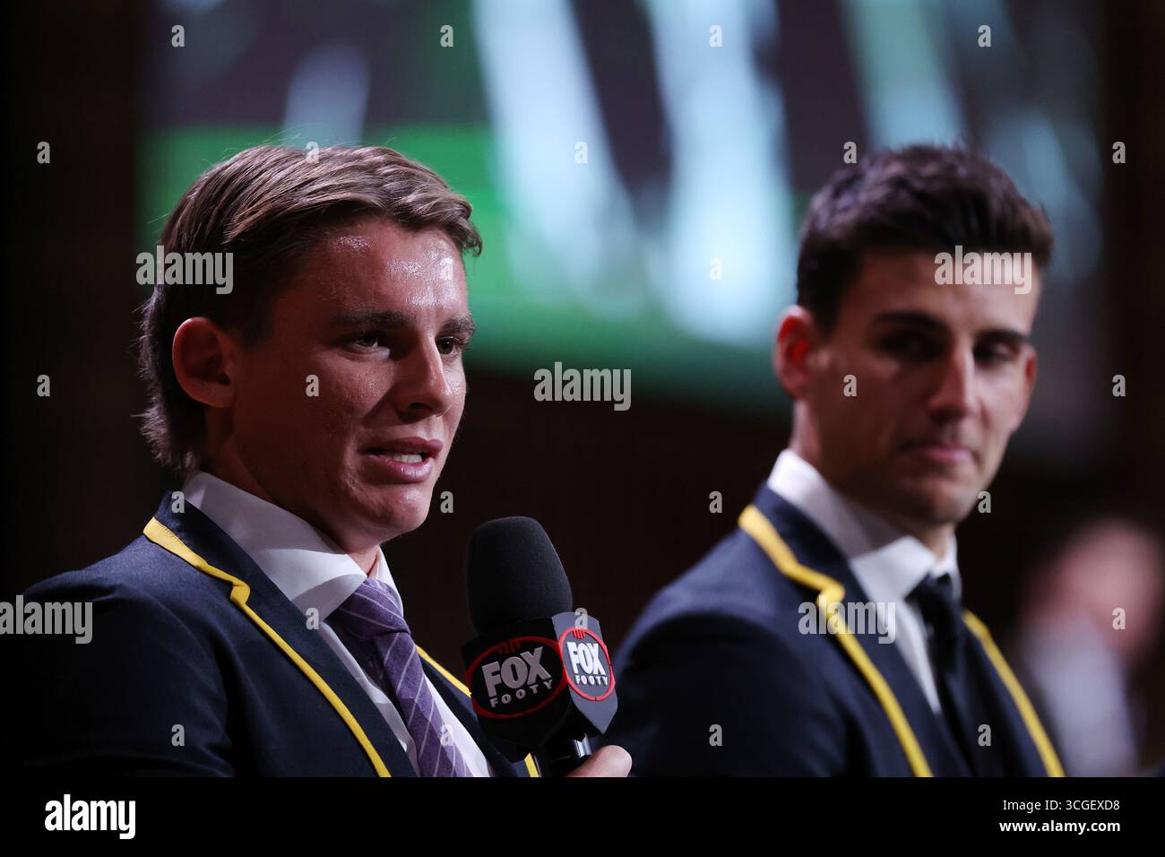 Caleb Serong (left) of the Dockers and Nick Daicos of the Magpies are ...