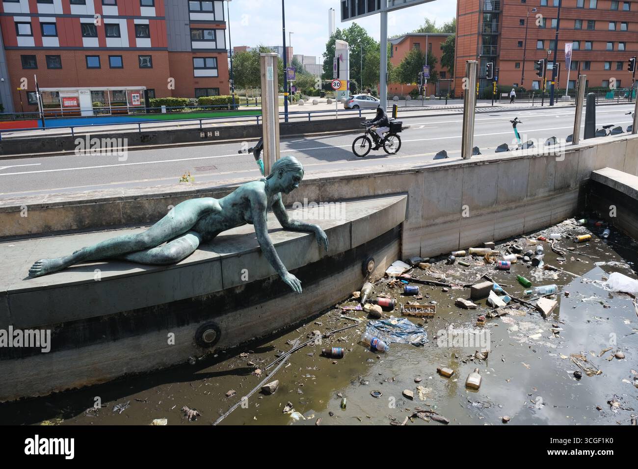 A sculpture representing the Greek goddess Hebe is seen next to rubbish ...