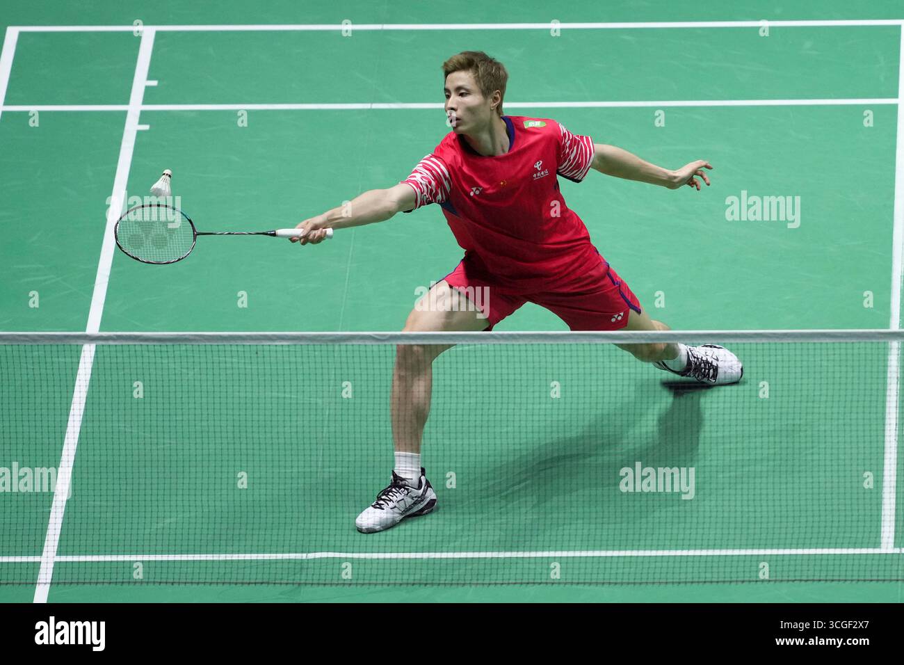 China's Shi Yu Qi plays France' s Christo Popov during their men's ...