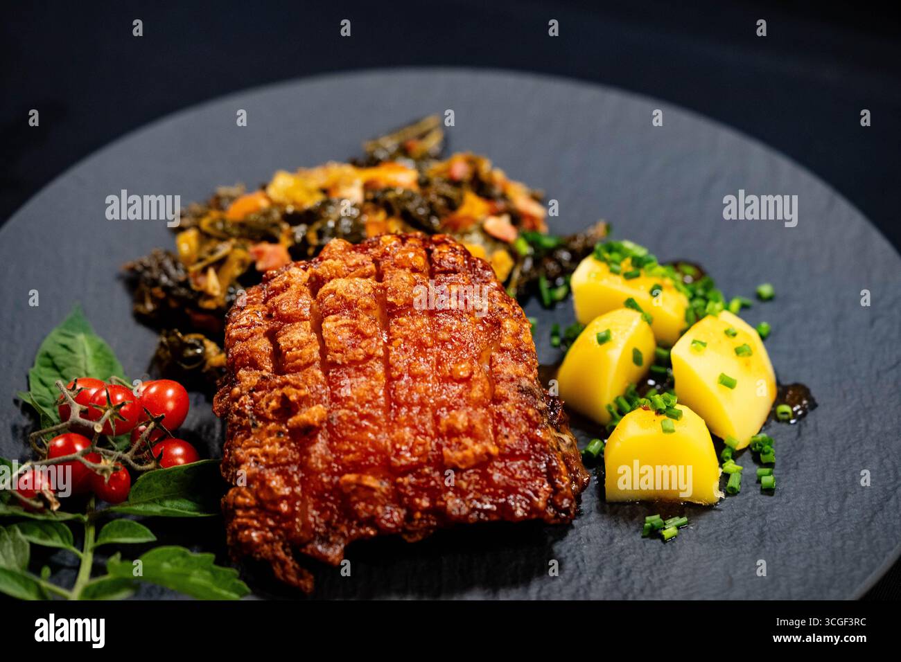 Crispy Pork Royal with savoy cabbage Stock Photo - Alamy