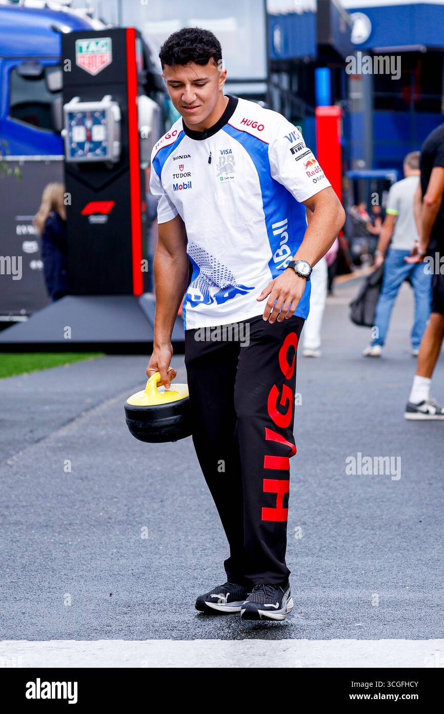 Isack Hadjar of France and Racing Bulls play curling prior to the start ...