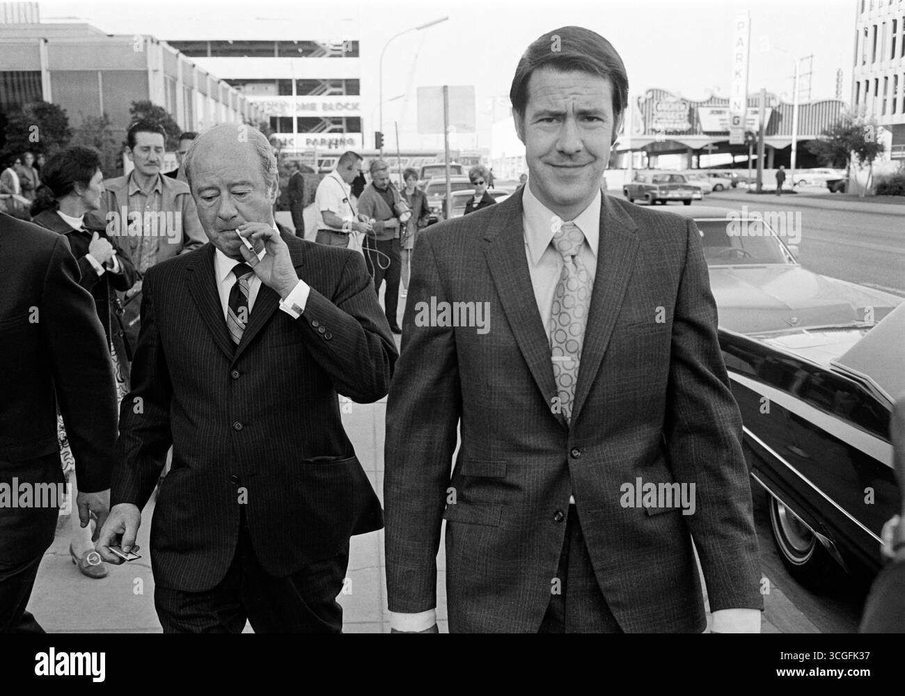 Robert Maheu, left and his son Peter, right, leave court in Las Vegas ...