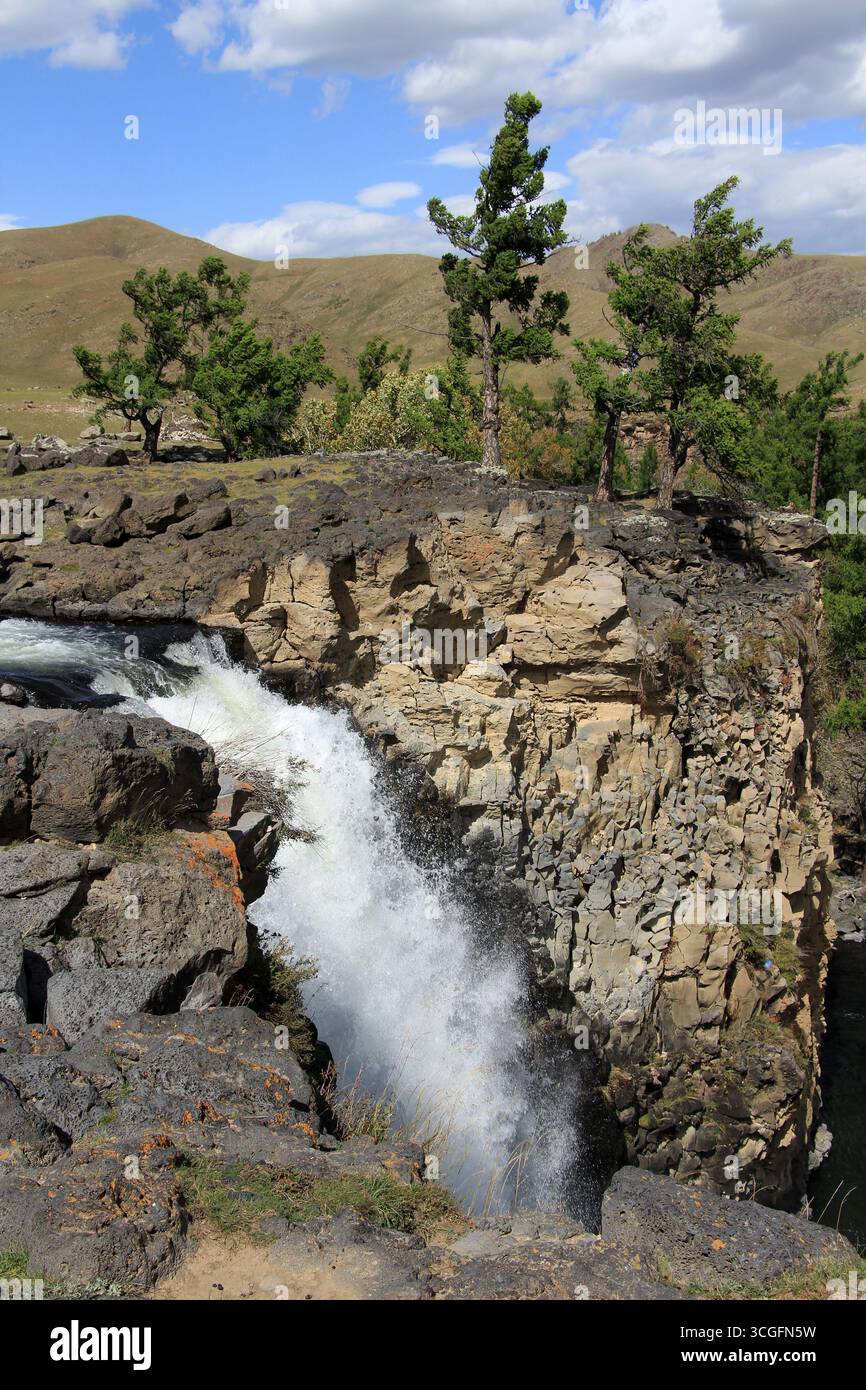 The Orkhon Waterfall is located in Mongolia. A small lake has formed ...