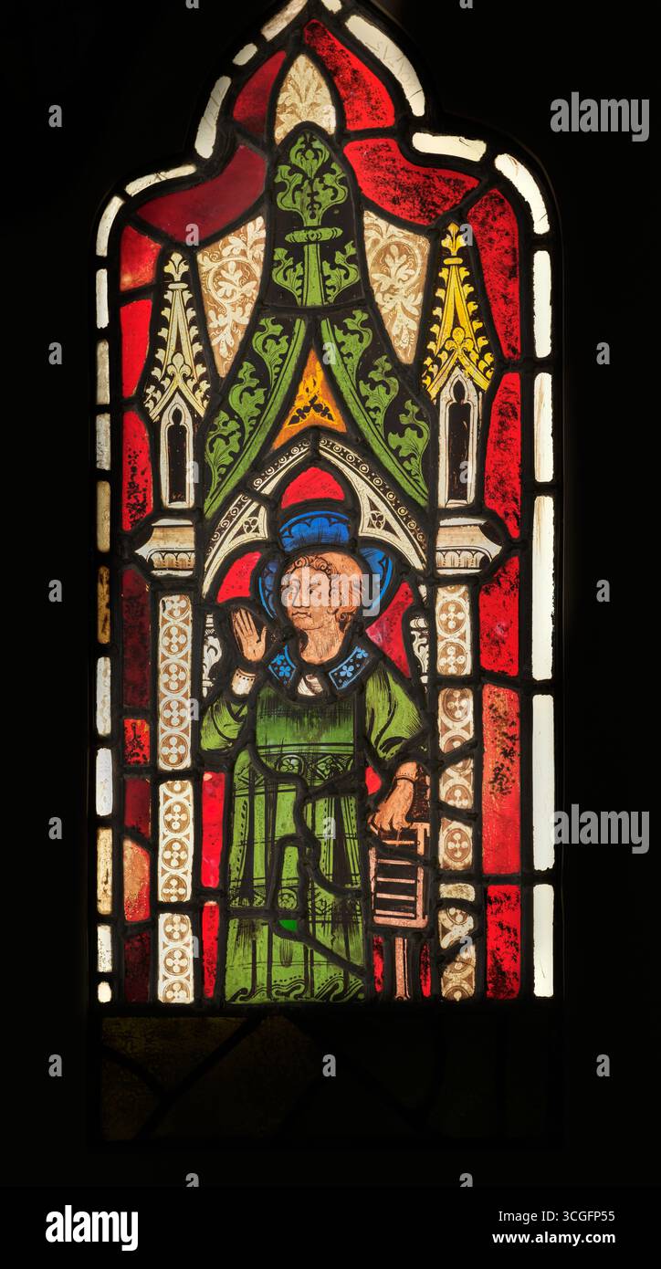 Medieval stained glass window, of St Lawrence with a gridiron Stock ...