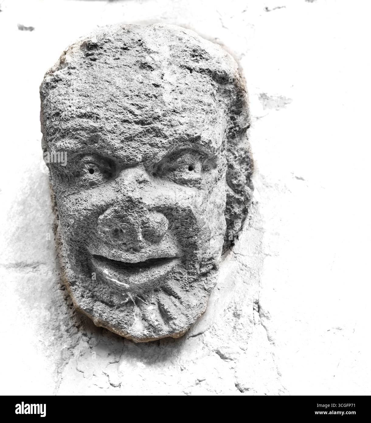 Medieval water spout in form of a head Stock Photo - Alamy