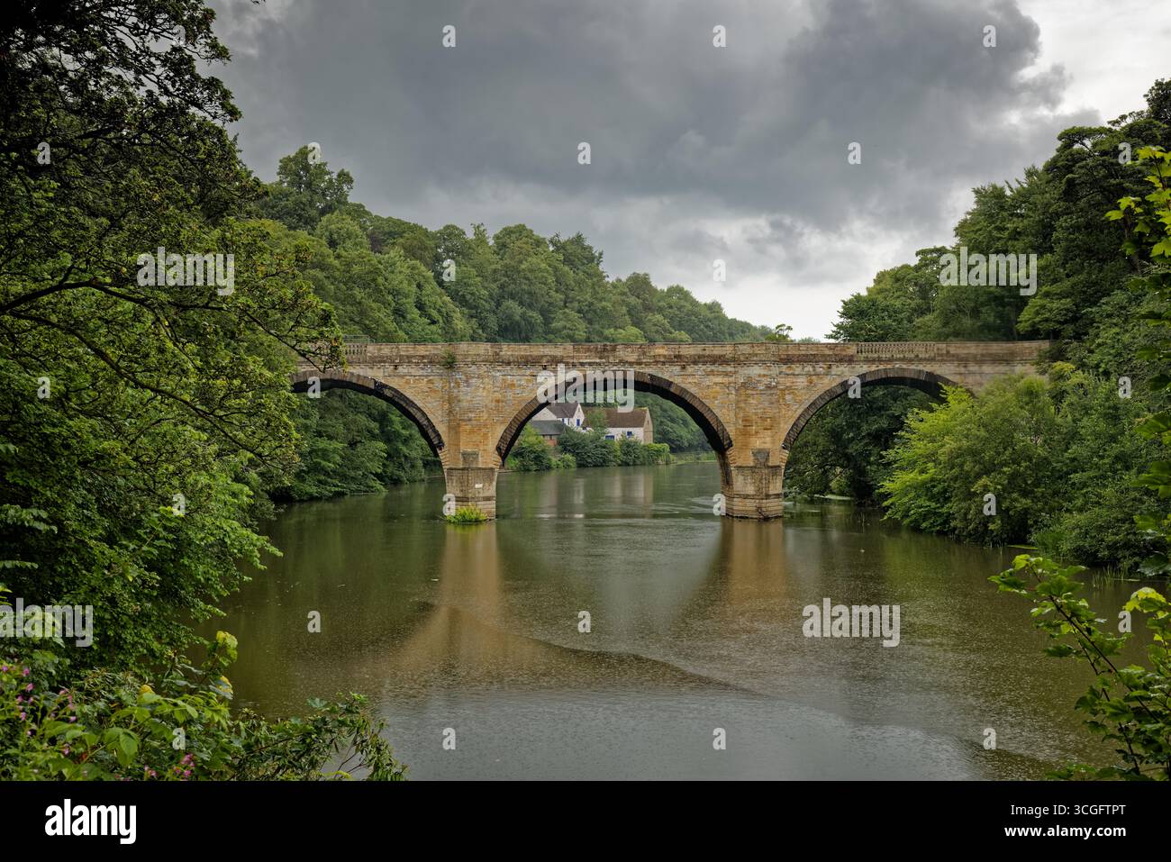 Prebends Bridge crosses the River Wear as gentle summer rain falls from ...