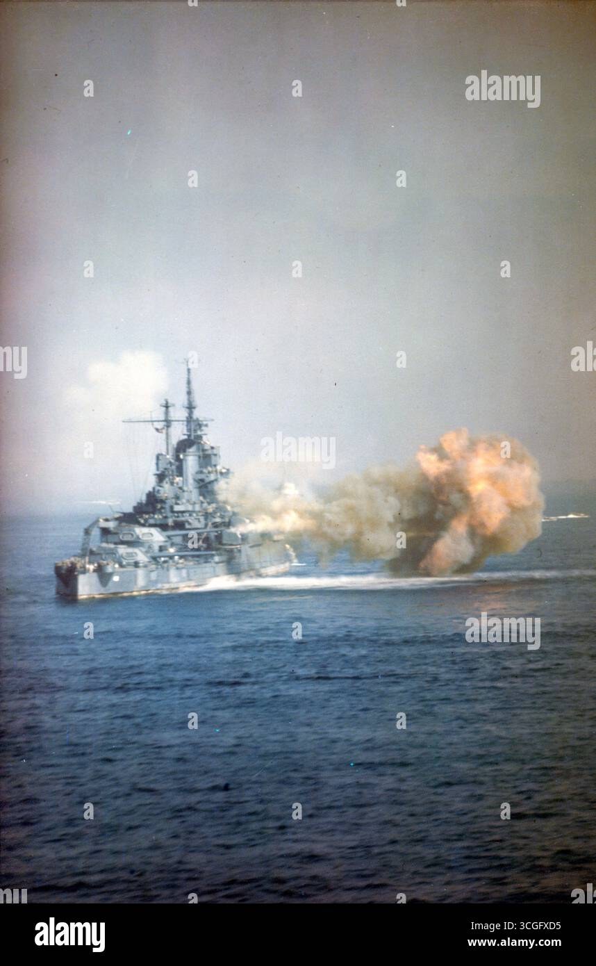 OKINAWA, JAPAN - 01 April 1945 - The USS Idaho (BB-42) fires the 14/50 ...