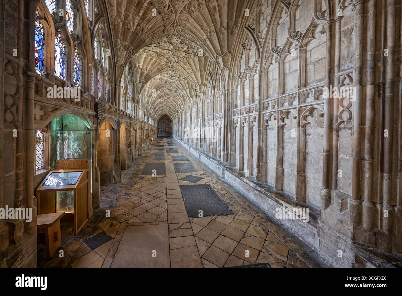 Gloucester Cathedral's medieval cloisters with vaulted ceiling and ...