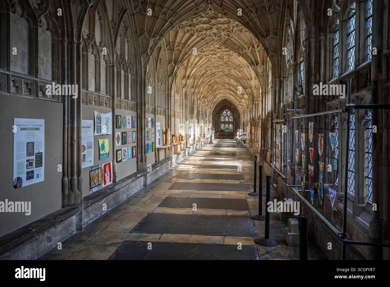 Gloucester Cathedral's medieval cloisters with vaulted ceiling and ...