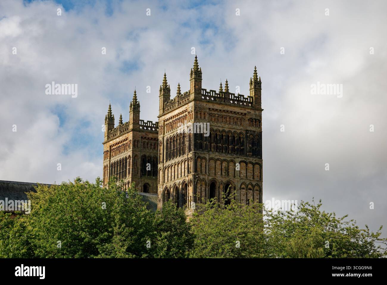 The ancient towers of the West Front of Durham Cathedral rise lit up by ...