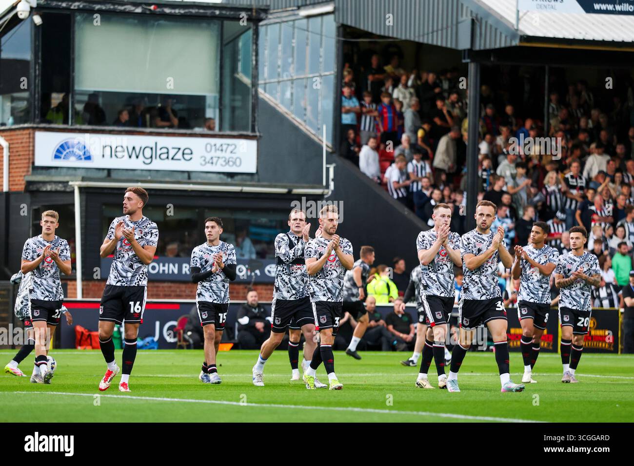 Grimsby players applaud the fans Grimsby Town defender Reece Staunton ...