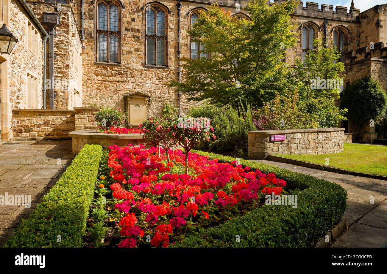 A colourful floral display in a memorial garden in the shadow of the ...