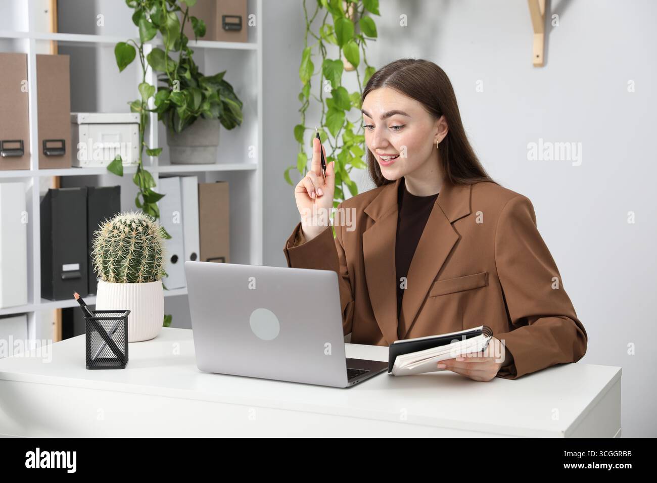 Woman having video call green hi-res stock photography and images - Alamy