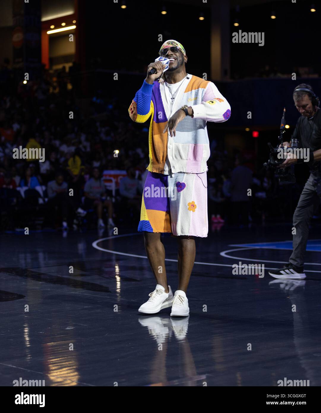 Rapper Young Dro performs at halftime during the basketball game ...