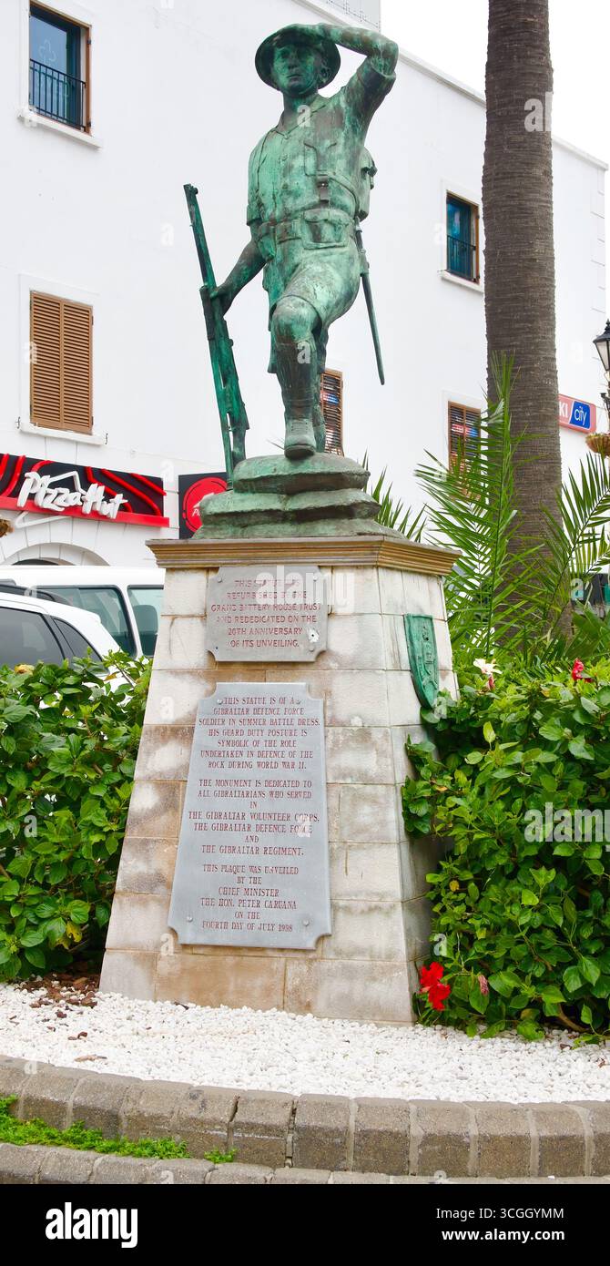 Memorial statue of a Gibraltar Defence Force soldier in summer uniform ...