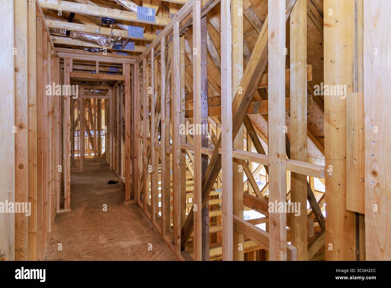 Construction wooden frames of residential interior with unfinished ...