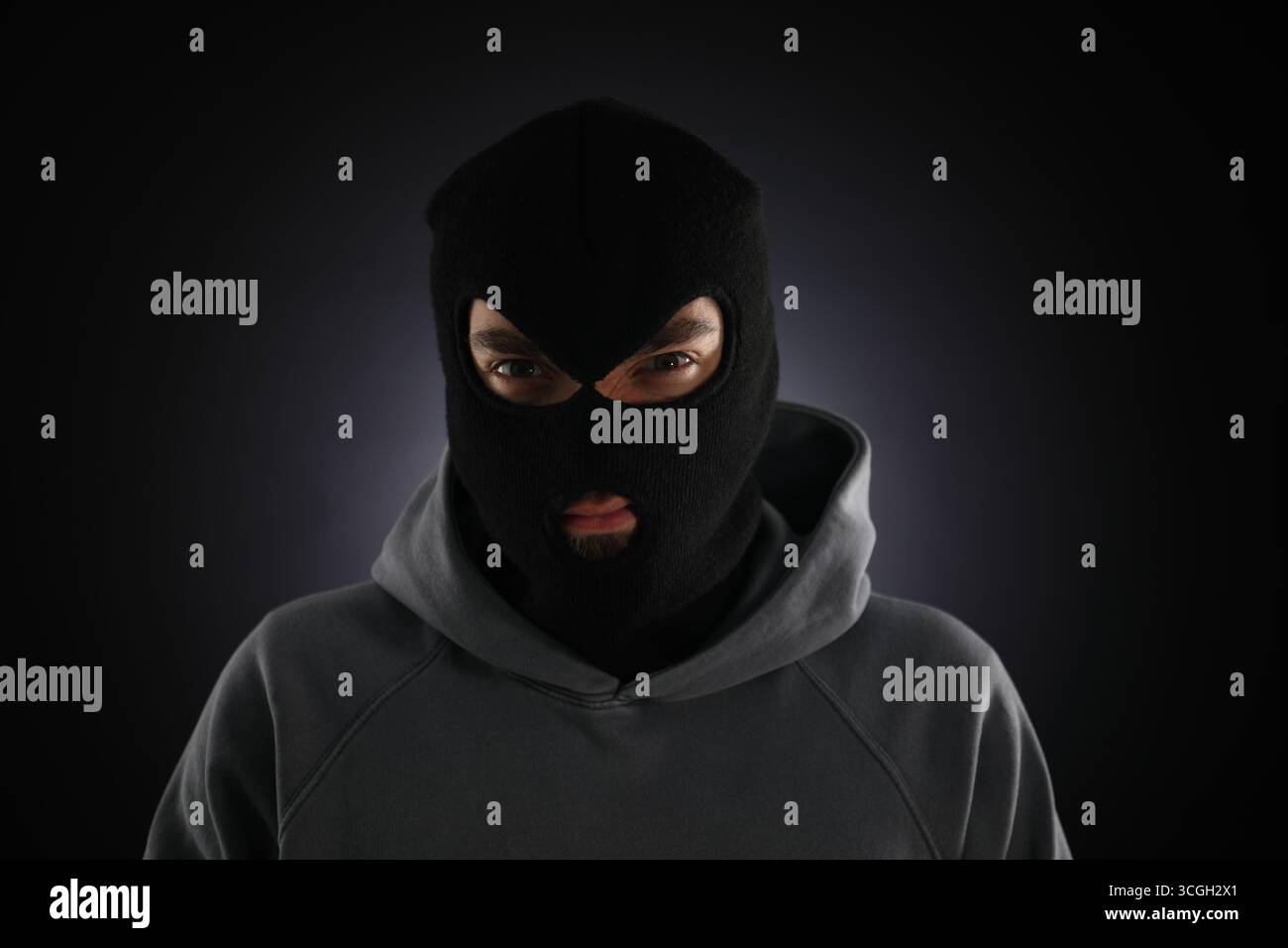 Suspicious man in mask hi-res stock photography and images - Alamy