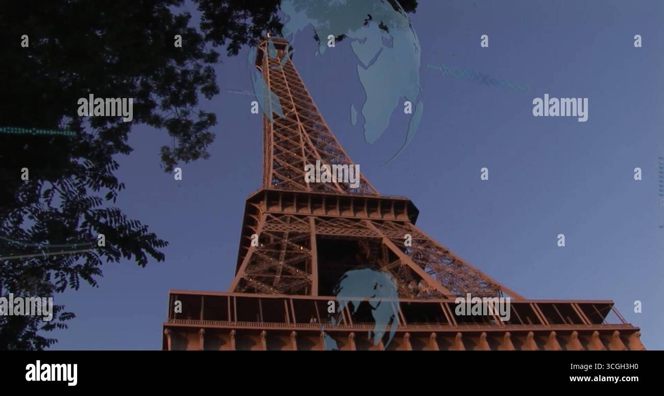 Rising Eiffel Tower reaching into Paris twilight sky, framing tree ...