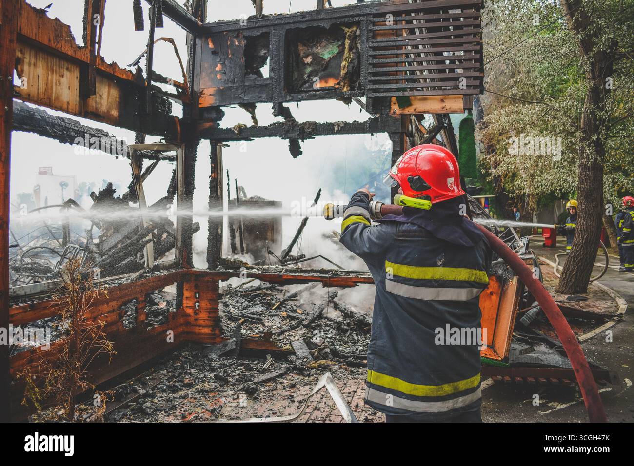 Firefighters extinguishing a fire in Belgrade, Serbia Stock Photo - Alamy