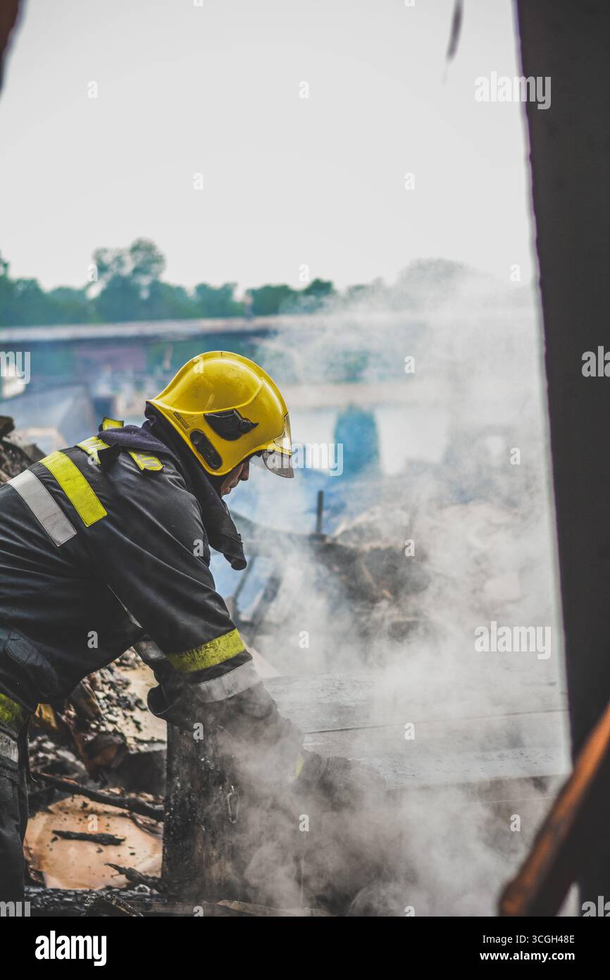 Firefighters extinguishing a fire in Belgrade, Serbia Stock Photo - Alamy
