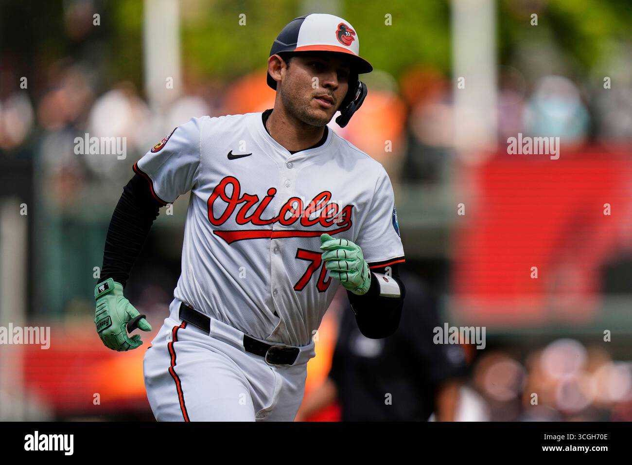 Baltimore Orioles' Alex Jackson (70) rounds the bases after hitting a ...