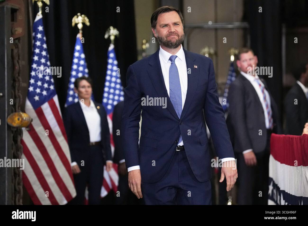 Vice President JD Vance arrives to speak during an event at Mid-City ...