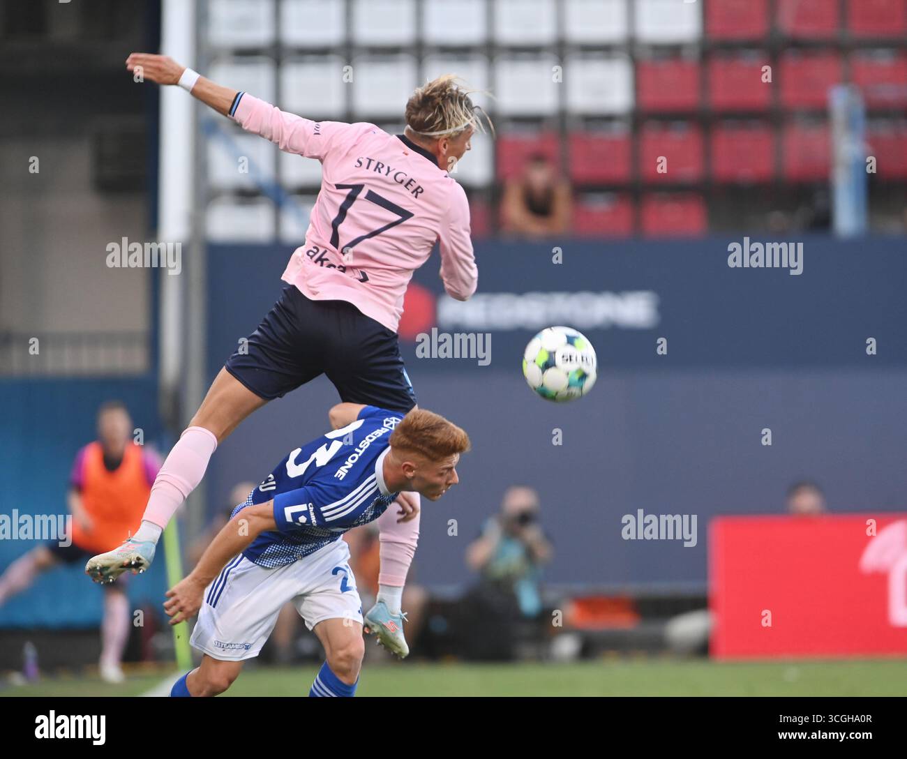 Jens Stryger of Malmo (up) and Andres Dumitrescu of Olomouc in action ...