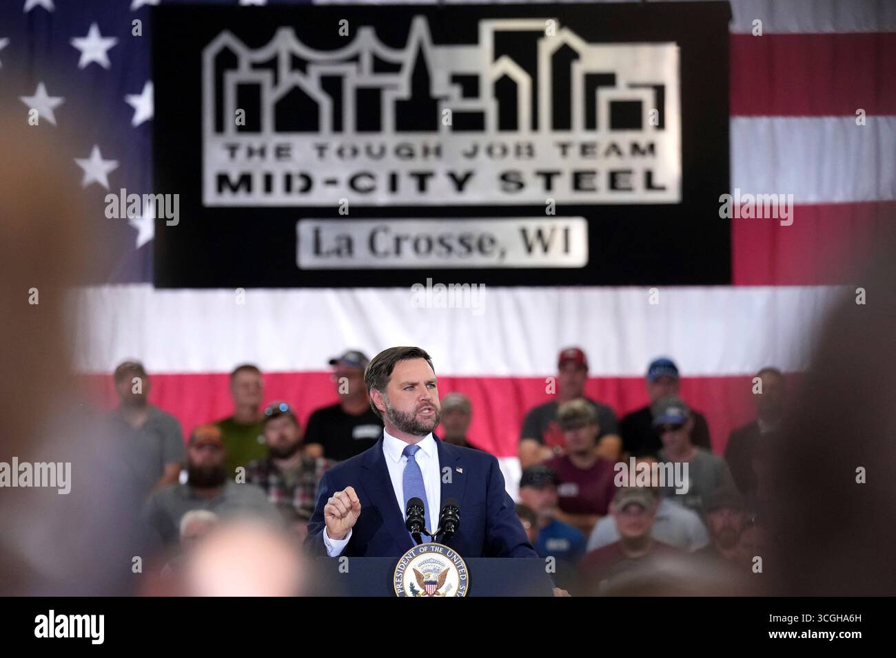 Vice President JD Vance speaks during an event at Mid-City Steel ...