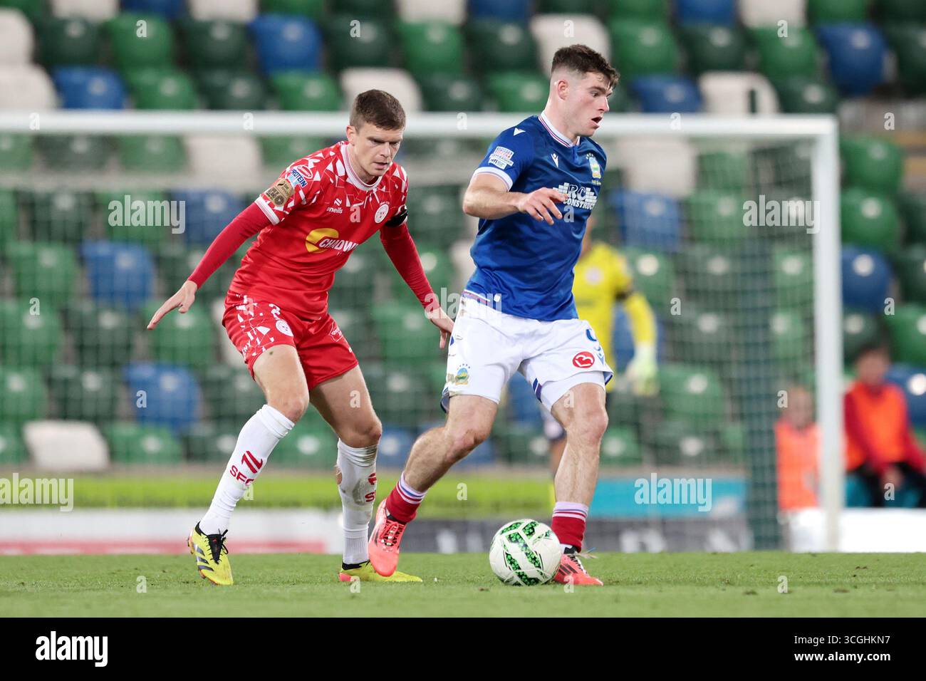 Shelbourne's Sean Gannon (left) and Linfield's Kieran Offord battle for ...